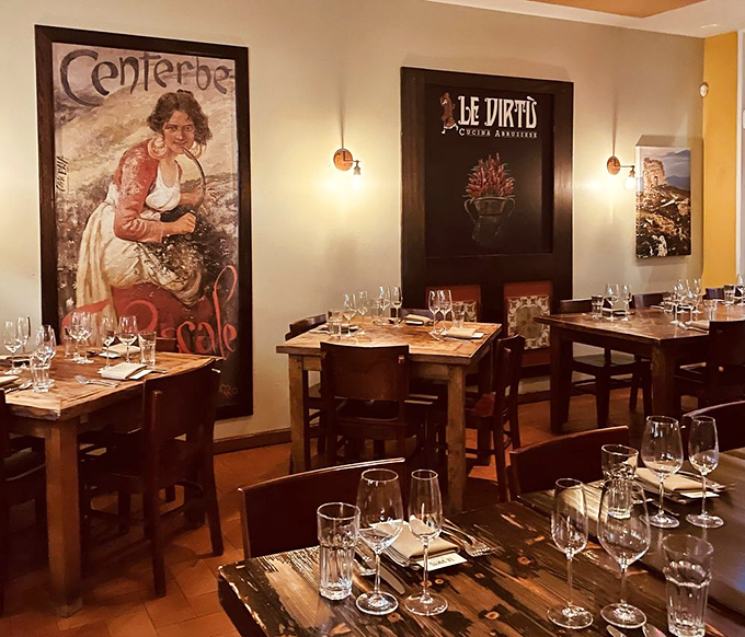 Step inside and you're transported straight to central Italy. The vintage posters and warm wooden tables create that perfect "I've discovered something special" feeling that makes a meal memorable.