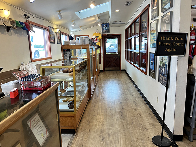 The pie display corridor&mdash;where breakfast dreams and dessert fantasies collide. That "Thank You, Please Come Again" sign is completely unnecessary after you've tasted their food.