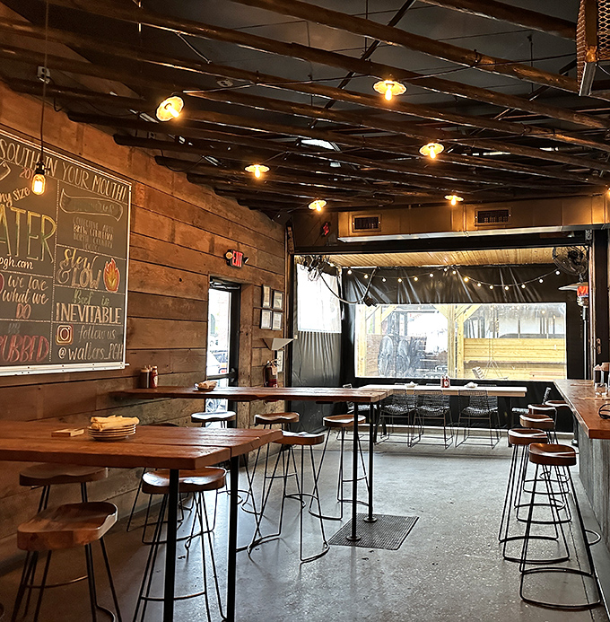 Rustic wooden walls meet industrial chic in this cozy interior. The kind of place where calories don't count and diet plans go to die.