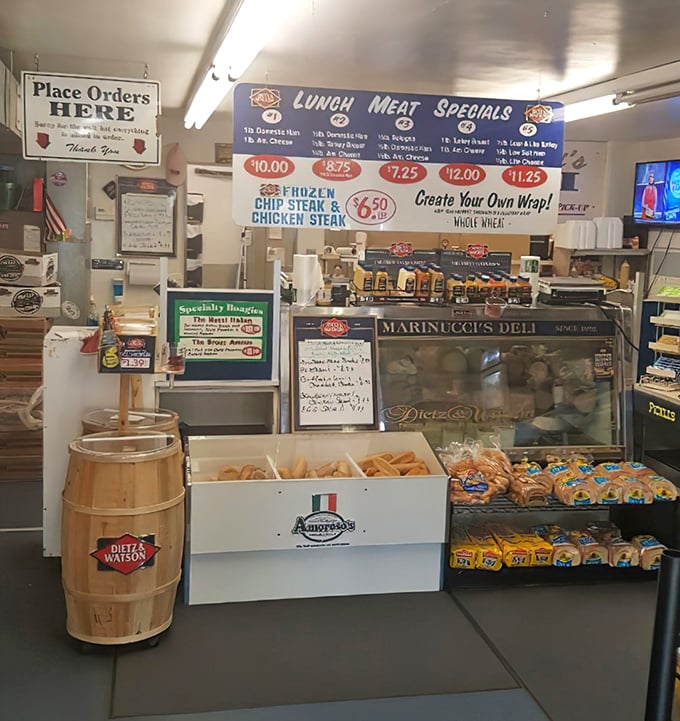A temple of sandwich worship where the counter staff performs the sacred ritual of hoagie assembly with practiced precision.