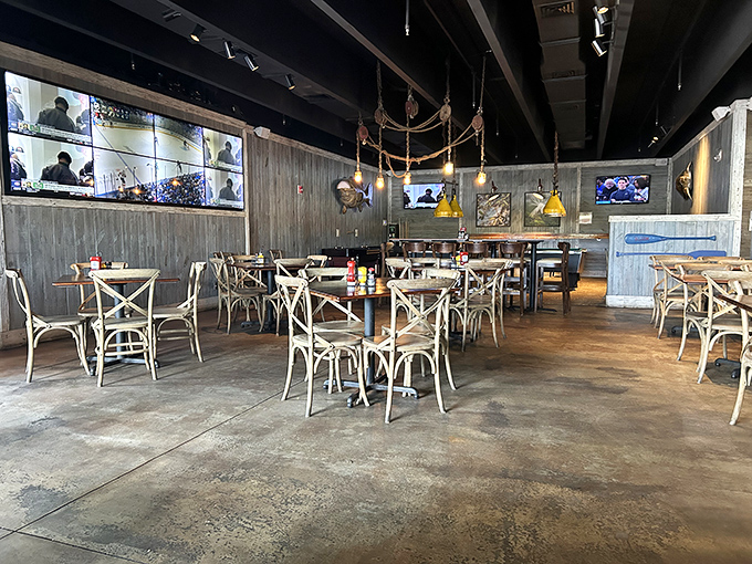 Step inside to a coastal haven where weathered wood meets nautical charm, creating the perfect backdrop for seafood indulgence and vacation memories.