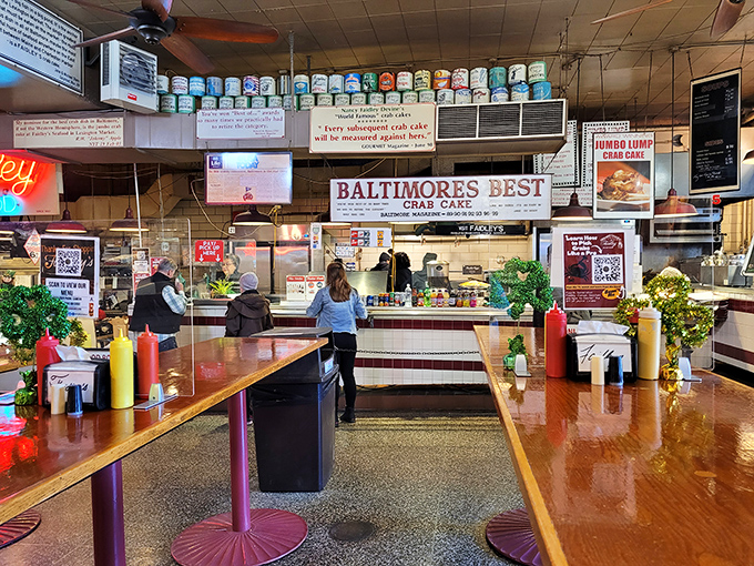 Standing-room-only wooden tables and "Baltimore's Best Crab Cake" signs tell you everything you need to know. This isn't about ambiance&mdash;it's about seafood that demands your full attention.