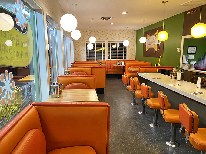 Orange vinyl booths and pendant lights create the perfect backdrop for breakfast epiphanies. This isn't retro by design&mdash;it's authentic by survival.