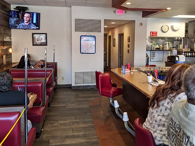 Those red vinyl booths have cradled more happy diners than a grandmother's rocking chair.
