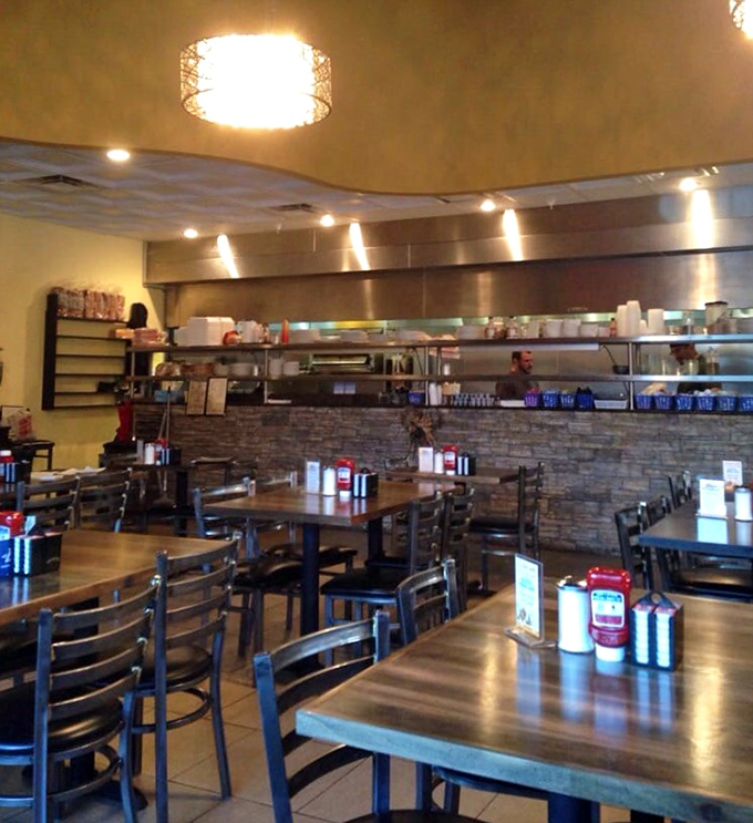 Inside, the warm stone accents and open kitchen create that perfect diner atmosphere&mdash;casual enough for breakfast, nice enough for a lunch meeting.