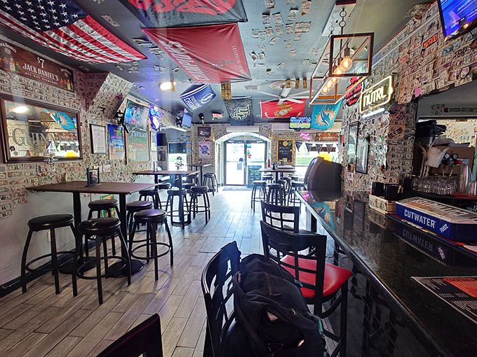 Dollar bills wallpaper and an American flag ceiling create that perfect "I've discovered something special" vibe that makes you feel instantly like a local.