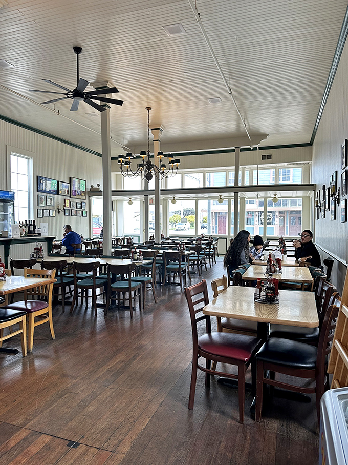 High ceilings, simple wooden tables, and natural light create the perfect backdrop for seafood feasting without pretension.