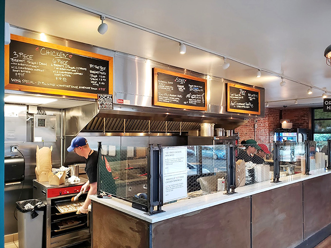 Elegant dining meets coastal comfort with Billy's impressive wine display. The warm wood beams overhead create the perfect atmosphere for seafood indulgence.