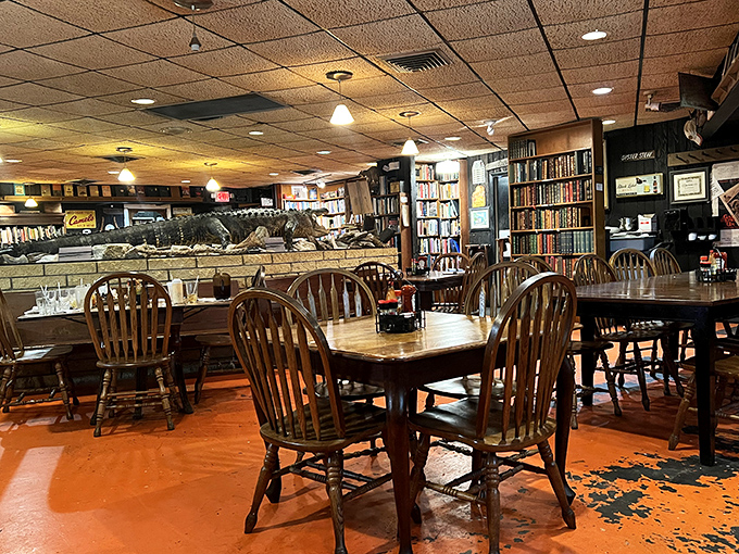 Inside, wooden chairs and bookshelves create a living room museum atmosphere. The orange floor has welcomed generations of diners seeking authentic Florida flavors.