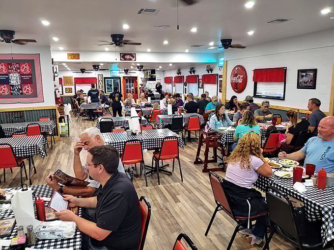 Inside, black and white checkered tablecloths and red chairs create that perfect "I've found somewhere special" atmosphere that keeps locals coming back.