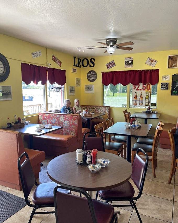 Sunshine-yellow walls, vintage signs, and cozy booths create that "everybody knows your name" atmosphere that makes Leo's feel like home.