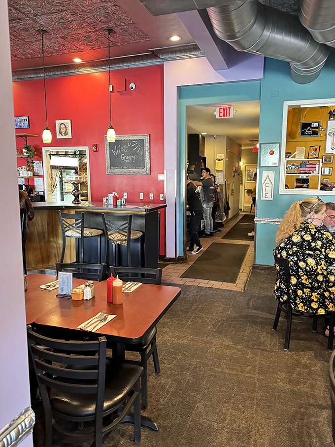 Inside, vibrant walls and exposed ductwork create that perfect "discovered gem" atmosphere. The kind of place where calories don't count and coffee refills are a given.