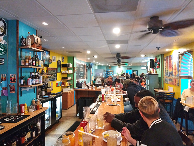 Inside, vibrant walls and a bustling bar create that perfect neighborhood vibe where strangers become friends over stories and spectacular seafood.