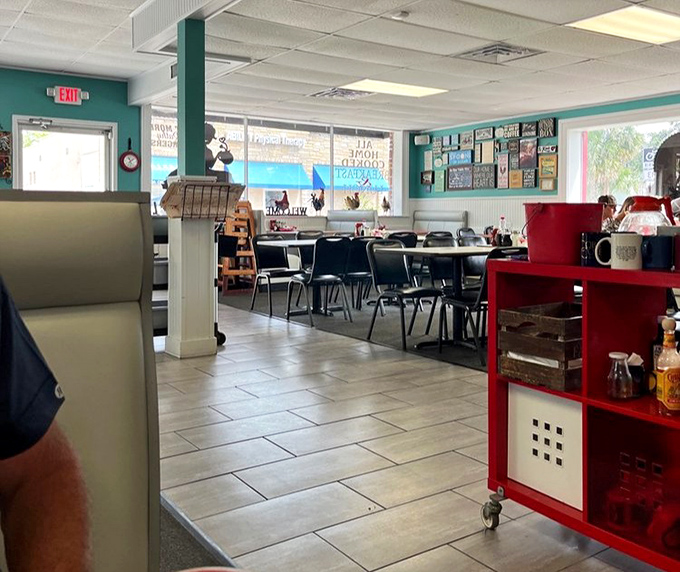 Classic diner vibes meet Florida sunshine in this turquoise-accented haven of morning comfort.