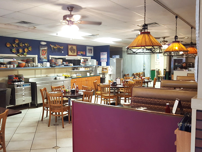 Classic diner ambiance with a Florida twist: pendant lighting, wooden chairs, and the promise of conversations worth eavesdropping on.