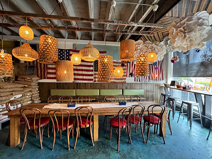 Woven pendant lights cast a golden glow over communal tables where strangers become friends, united by their mutual love of exceptional carbohydrates.