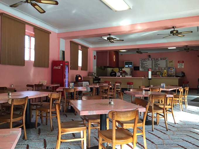 Pink walls, wooden chairs, and ceiling fans that haven't changed in decades&mdash;this isn't interior design, it's sandwich authenticity in its natural habitat.