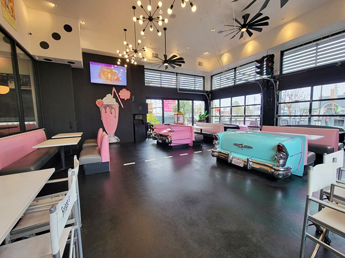 Car-shaped booths aren't just Instagram bait&mdash;they're the perfect vessels for your journey to flavor town. Pink Cadillacs and turquoise beauties make every meal feel like a sock hop.