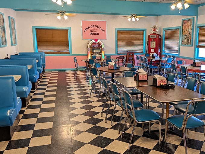 Step into a time warp where turquoise booths, checkerboard floors, and a vintage jukebox transport you to simpler, more delicious times.