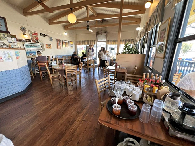 Wooden beams, local art, and that half-blue wall &ndash; the dining room feels like breakfast at your coolest aunt's house.