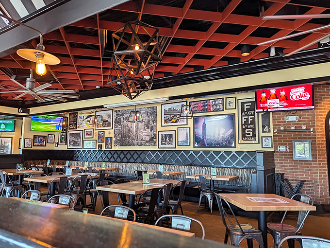 New York nostalgia meets Florida sunshine under this distinctive red lattice ceiling. The walls practically whisper "fuggedaboutit" with every NYC photograph.