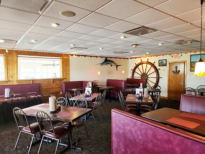 Nautical without being kitschy, this dining room says, "We're too busy perfecting our seafood to worry about interior design magazines." That ship's wheel isn't ironic&mdash;it's authentic.