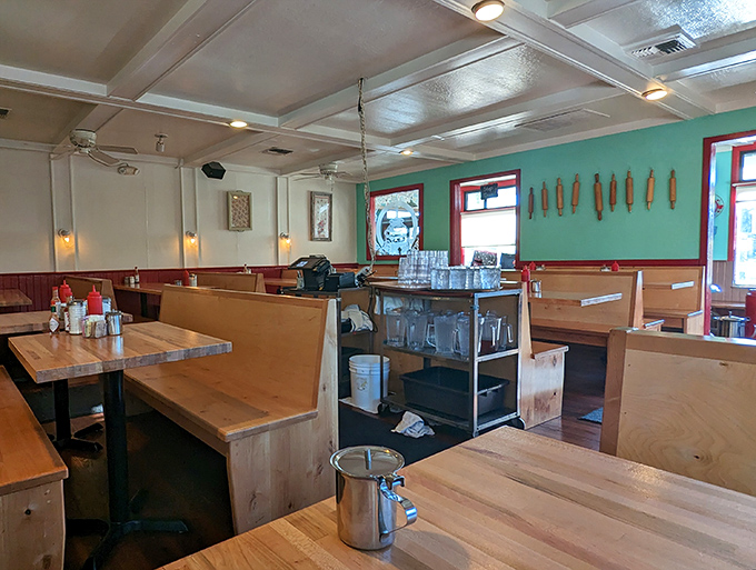 Wooden booths worn smooth by decades of happy diners, turquoise walls, and that unmistakable aroma of breakfast perfection. Home isn't a place; it's this feeling.