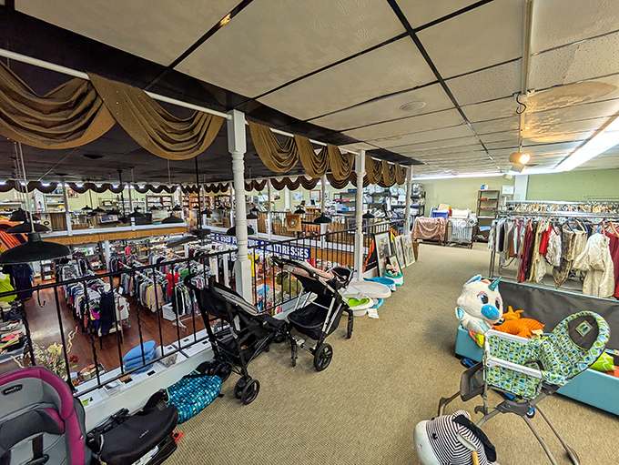 Fabric swags add unexpected elegance to this treasure trove. Baby gear galore for grandparents stocking up for weekend visits!