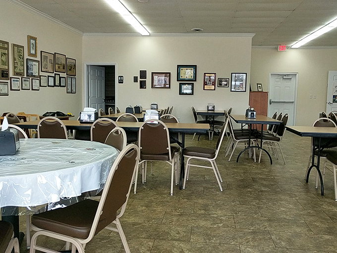 Simple tables and chairs create the perfect backdrop for life's sweetest conversations, while wall accolades tell stories of community impact.