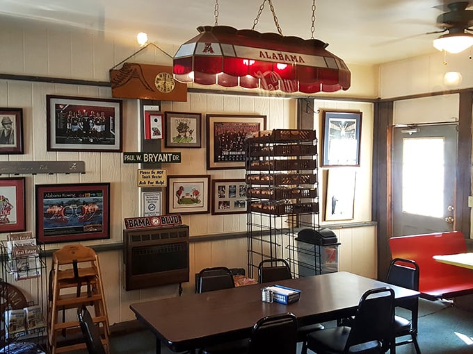 Alabama football reigns supreme inside these walls. The Crimson Tide lamp illuminates a dining room where BBQ and team loyalty go hand in hand.
