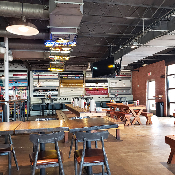 Industrial-chic meets comfort in this no-nonsense dining room. The wooden tables practically whisper, "Sit down, stay awhile, and prepare to get deliciously messy."