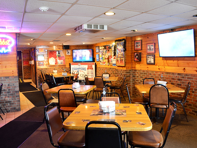 Wood paneling, brick accents, and sports memorabilia create that perfect "come as you are" atmosphere where comfort meets quality.