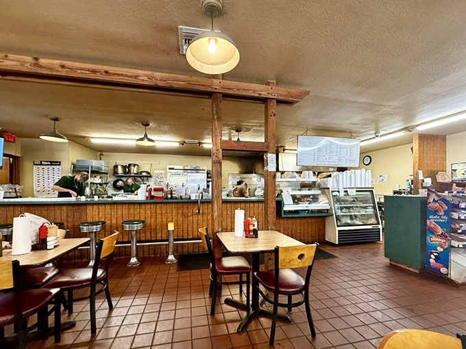Where magic happens! Wood paneling, simple tables, and that unmistakable aroma of slow-smoked meats create the perfect setting for barbecue bliss.