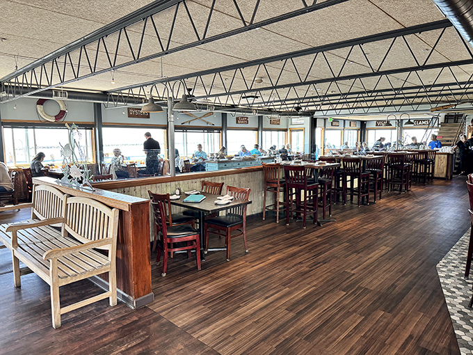 Inside, warm wooden tones and expansive windows frame the Pacific, turning every meal into dinner and a show.