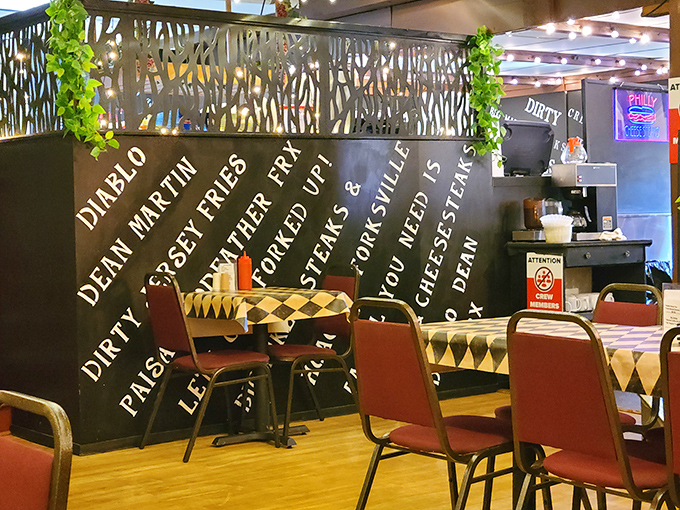 The wall of fame showcases legendary sandwiches like culinary celebrities. Those checkered tablecloths aren't just decoration&mdash;they're landing pads for imminent deliciousness.