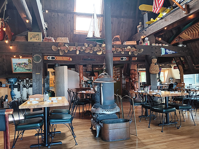Step inside and you're transported to a maritime time capsule. That wood-burning stove isn't just for show&mdash;it's keeping Michigan winters at bay while you feast.