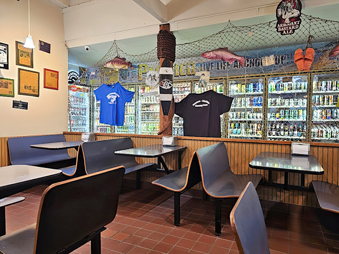 Nautical charm meets casual comfort inside, where fishing nets and memorabilia create the perfect backdrop for seafood feasting.