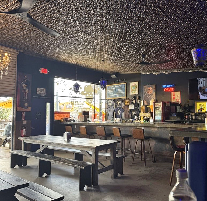 Inside, the textured ceiling and no-nonsense wooden tables say, "We're serious about barbecue, not fancy furniture." Pure BBQ focus.