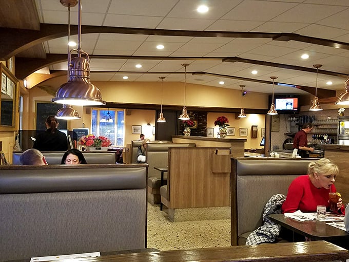 Cozy booths and warm lighting create the perfect atmosphere for memorable morning meals.