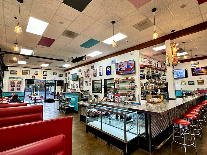 Step inside and the decades melt away&mdash;colorful ceiling tiles, red vinyl booths, and memorabilia create a time capsule where conversation flows as freely as the coffee.