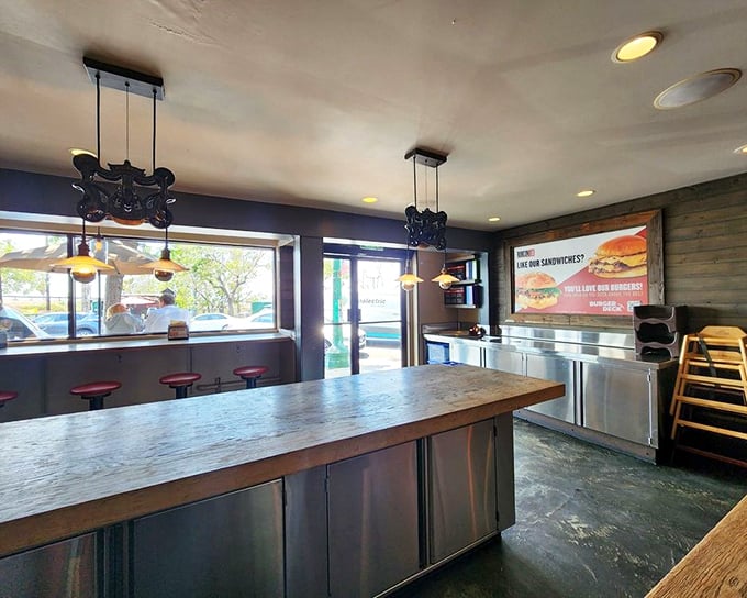 Industrial-chic meets sandwich paradise. The wooden counter isn't just functional&mdash;it's where bread-based dreams come true.