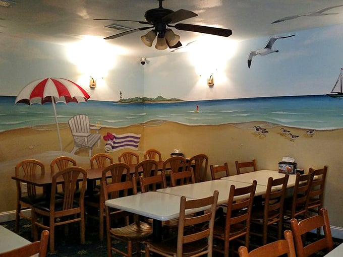 Beach vibes without the sand in your shorts. The mural transforms ordinary dining into oceanside feasting, complete with painted seagulls that won't steal your hush puppies.