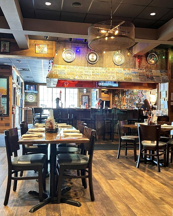 Step inside and the rustic charm immediately wraps around you like a warm, smoky hug. Those hanging lights aren't just illuminating&mdash;they're spotlighting barbecue greatness.