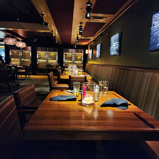 Polished wooden tables and leather seating create that perfect "fancy but not fussy" atmosphere where you can actually hear your dinner companions.