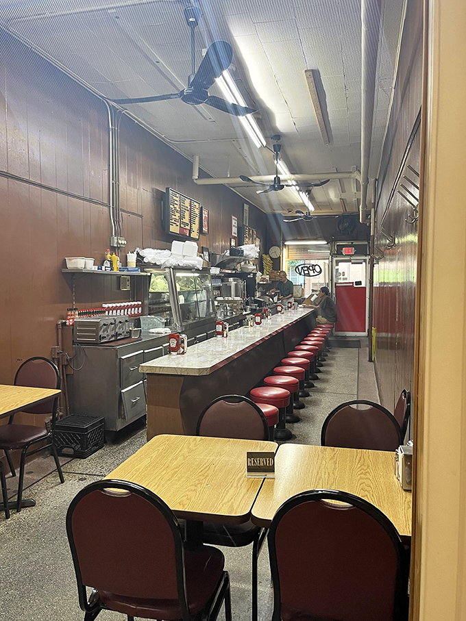 The classic counter with its row of red vinyl stools isn't retro by design&mdash;it's authentic by survival, a diner that never needed reinvention.