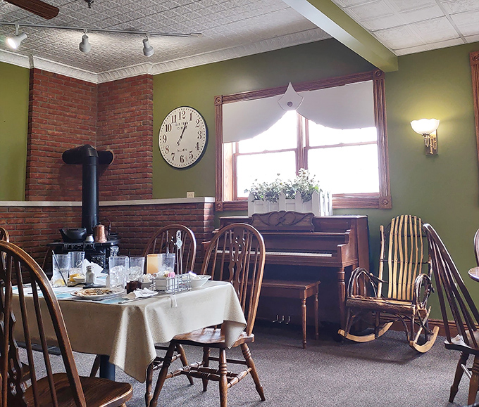 A cozy corner where time slows down &ndash; complete with vintage stove, rocking chair, and piano. This isn't decoration; it's a warm embrace from simpler times.