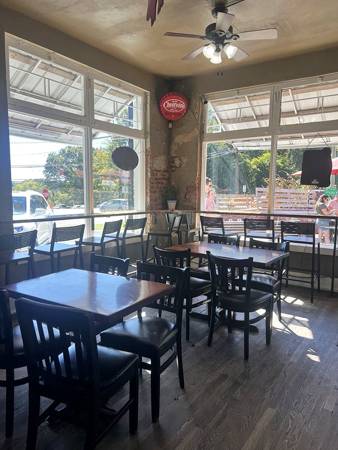 Sunlight streams through large windows, illuminating a no-frills dining area where sandwich dreams come true. Fancy isn't on the menu, but satisfaction is.