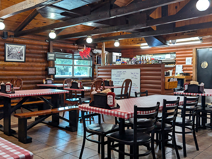 Those checkered tablecloths and log walls create the perfect backdrop for serious barbecue conversations and satisfied sighs.