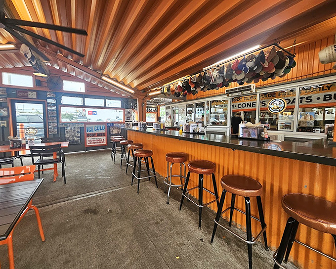 Step inside and the wooden ceiling beams, classic counter, and baseball cap collection tell you this isn't just a restaurant&mdash;it's a community institution.