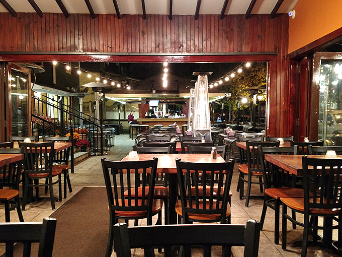 Inside, wooden beams and warm lighting create that perfect tavern atmosphere where memories are made and calories don't count.